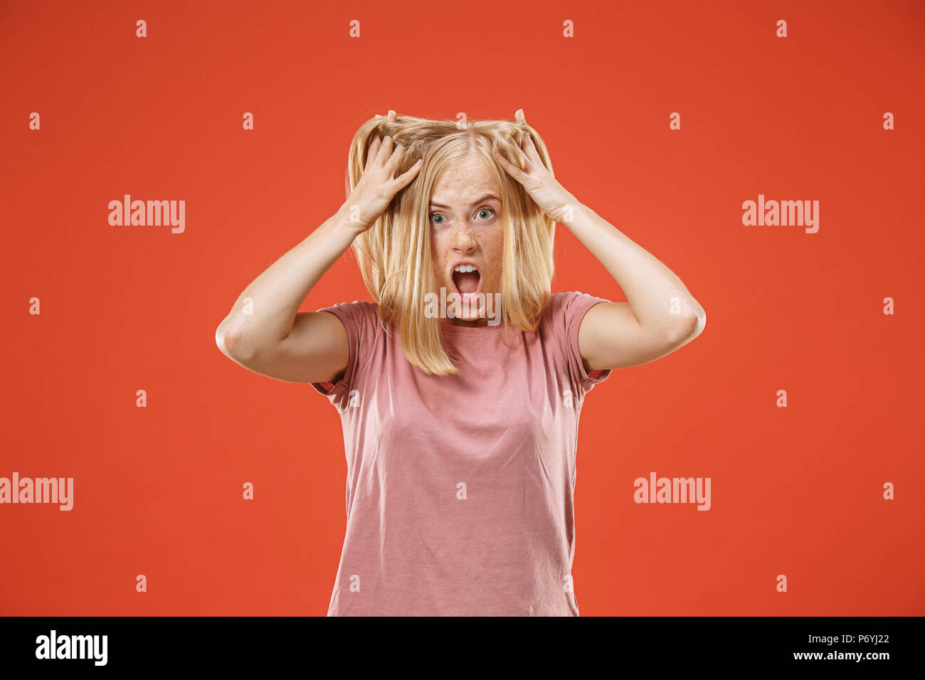 A portrait of surprised screaming woman Stock Photo - Alamy