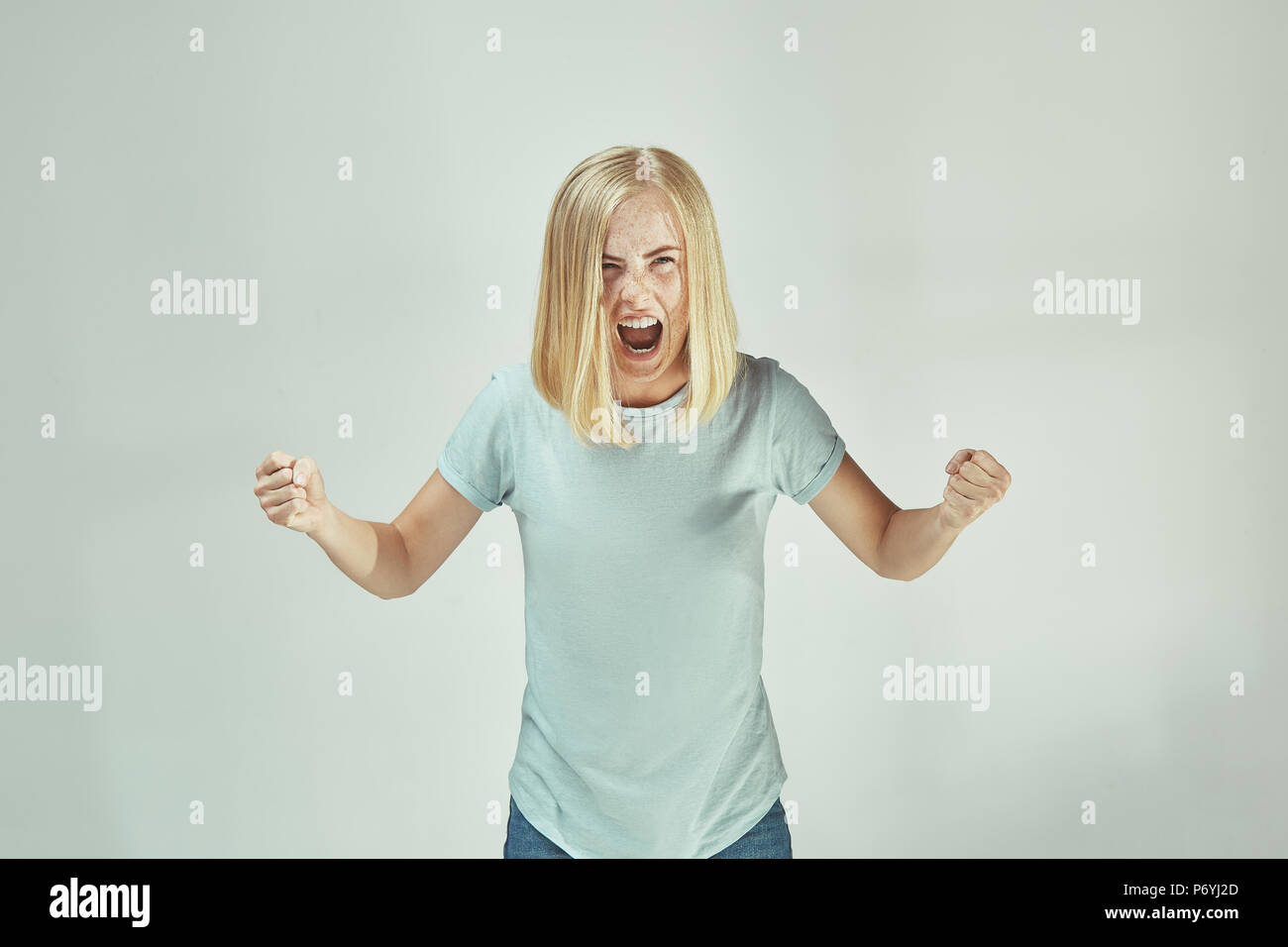 A portrait of surprised screaming woman Stock Photo - Alamy