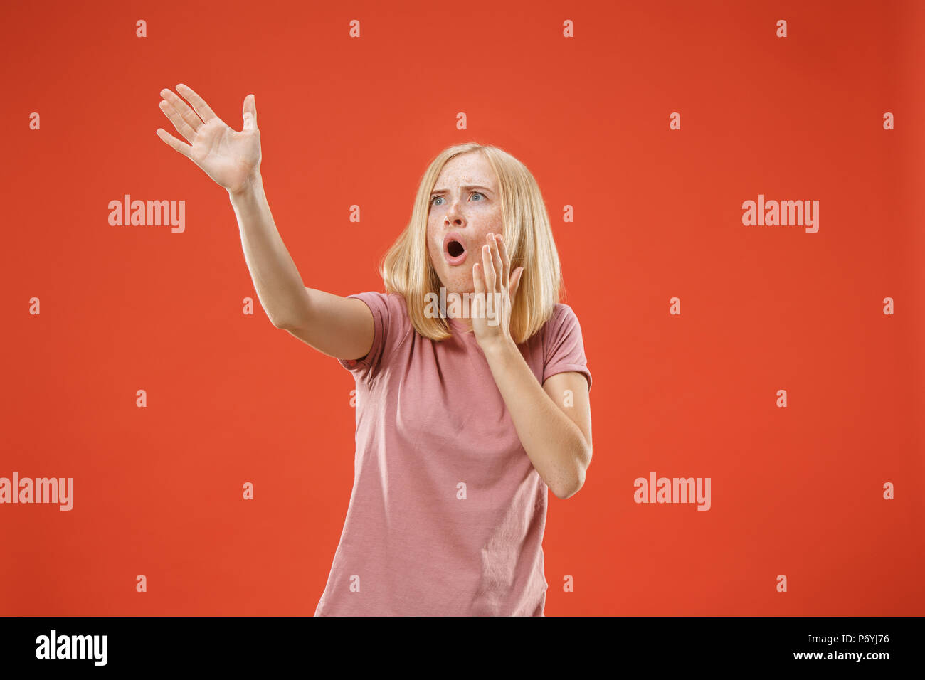 A portrait of surprised screaming woman Stock Photo - Alamy