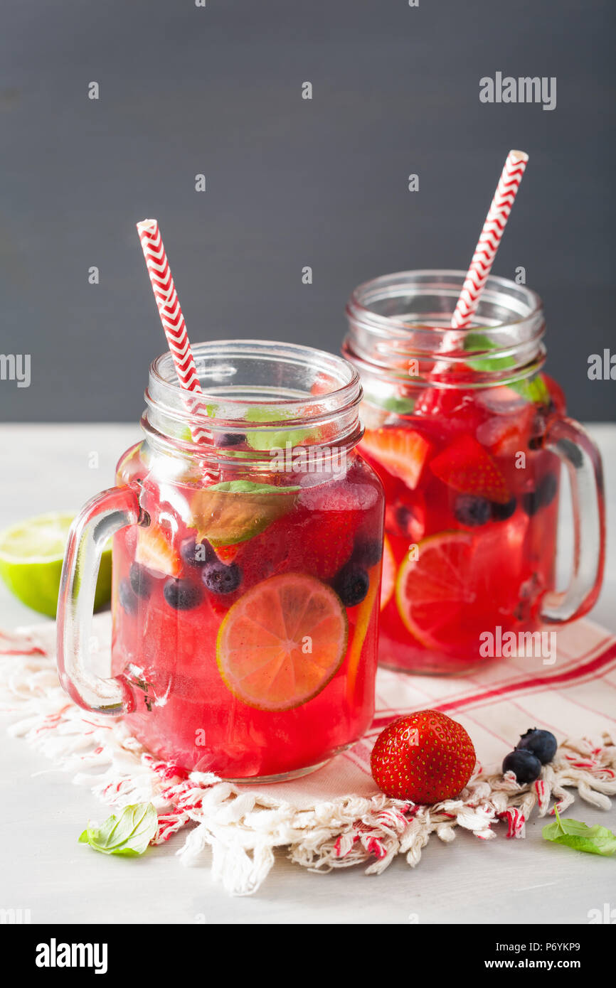 summer berry lemonade with lime and mint in mason jar Stock Photo - Alamy