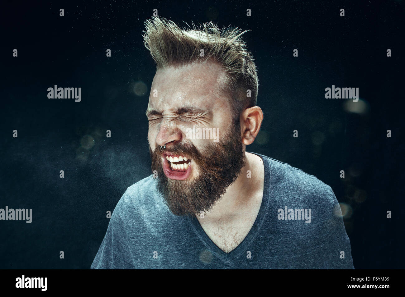 Sneezing young male hi-res stock photography and images - Alamy