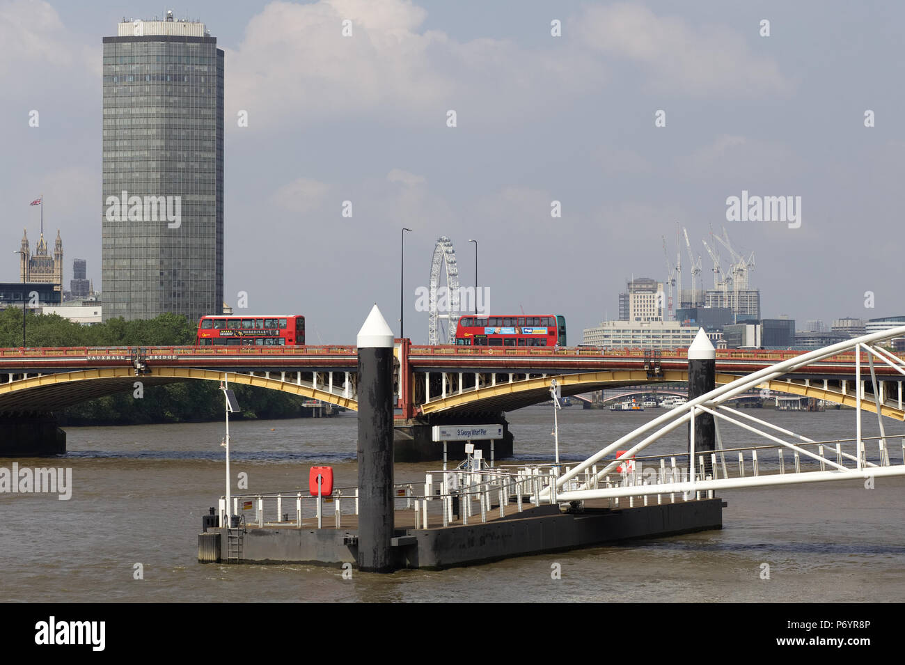 London bus crossing the vauxhall bridge hi-res stock photography and ...