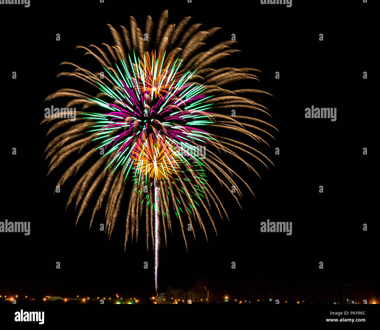 Fireworks - 5 colorful bursts within bursts with rocket trail from the ...