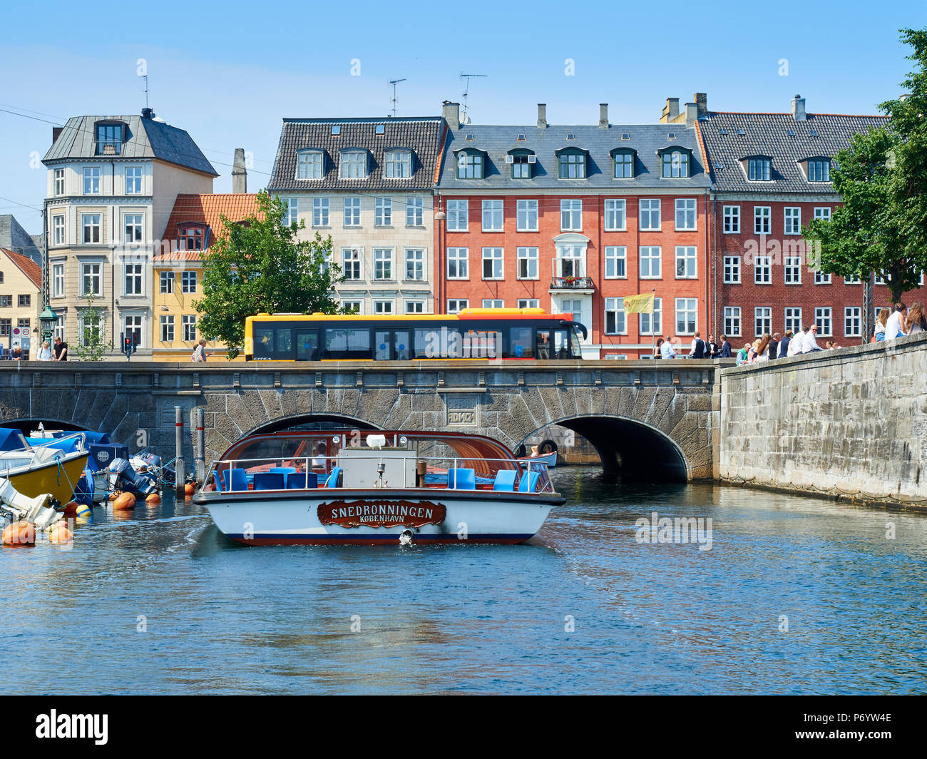 Copenhagen, Denmark - June 2016: boat sailing under the bridge along ...