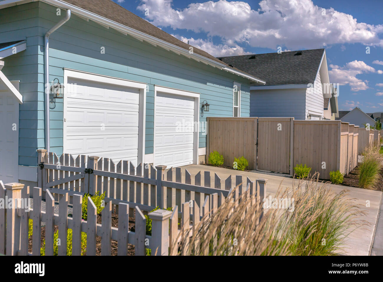 Garages on back side of homes Stock Photo - Alamy