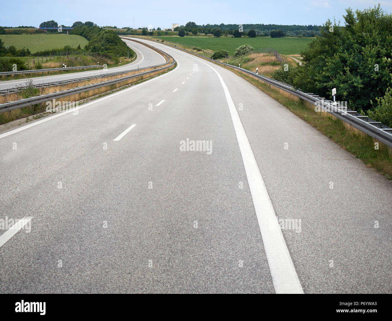 Curved empty road highway or freeway Stock Photo - Alamy