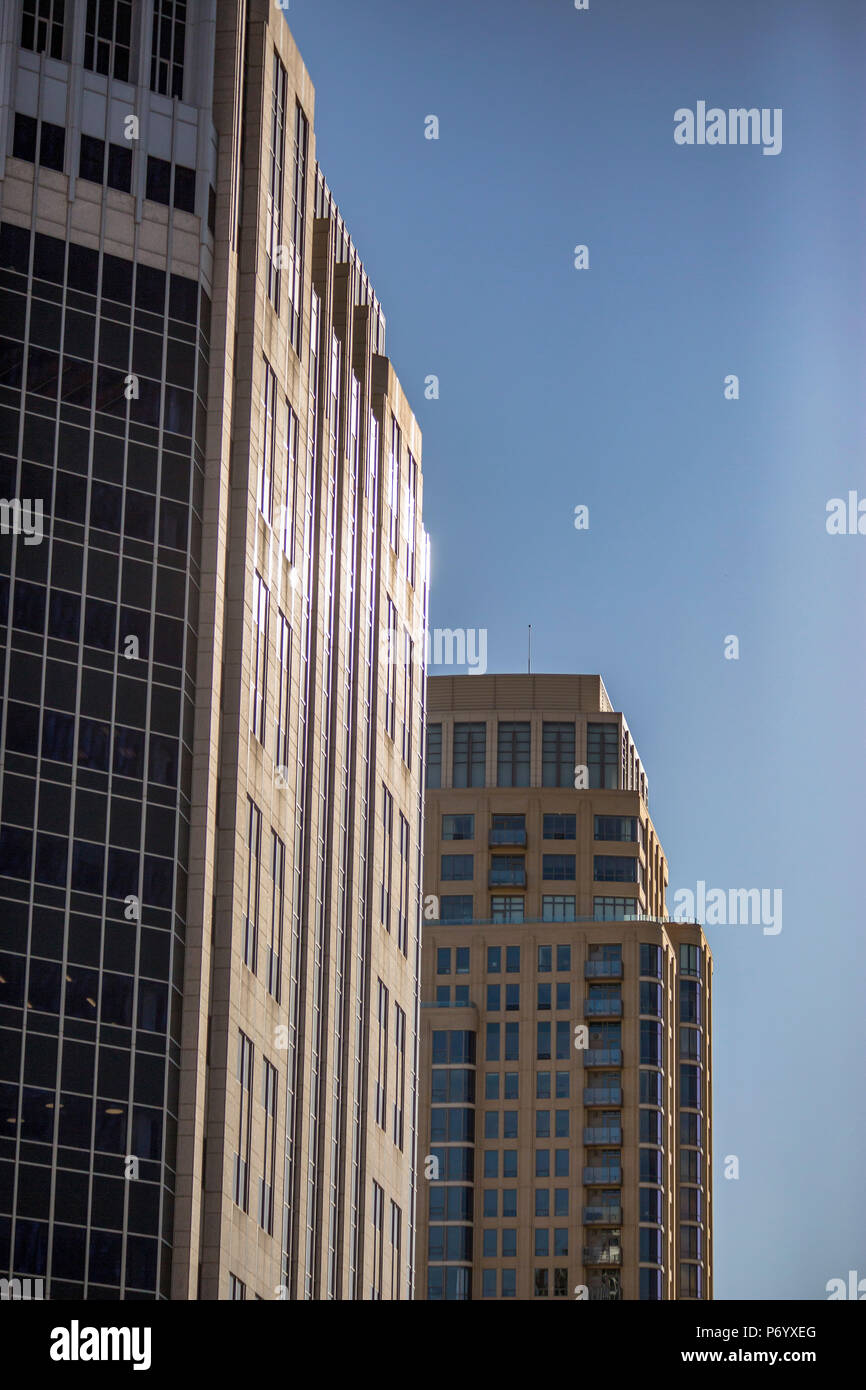 High rise buildings with sun reflection downtown Stock Photo - Alamy