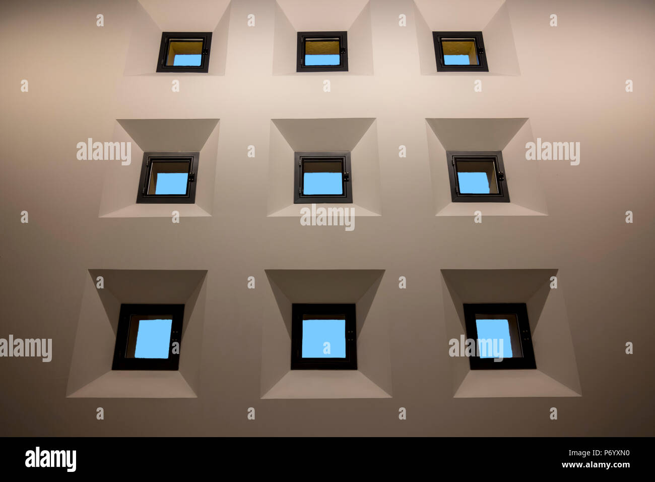 Wall with Small Windows Stock Photo - Alamy