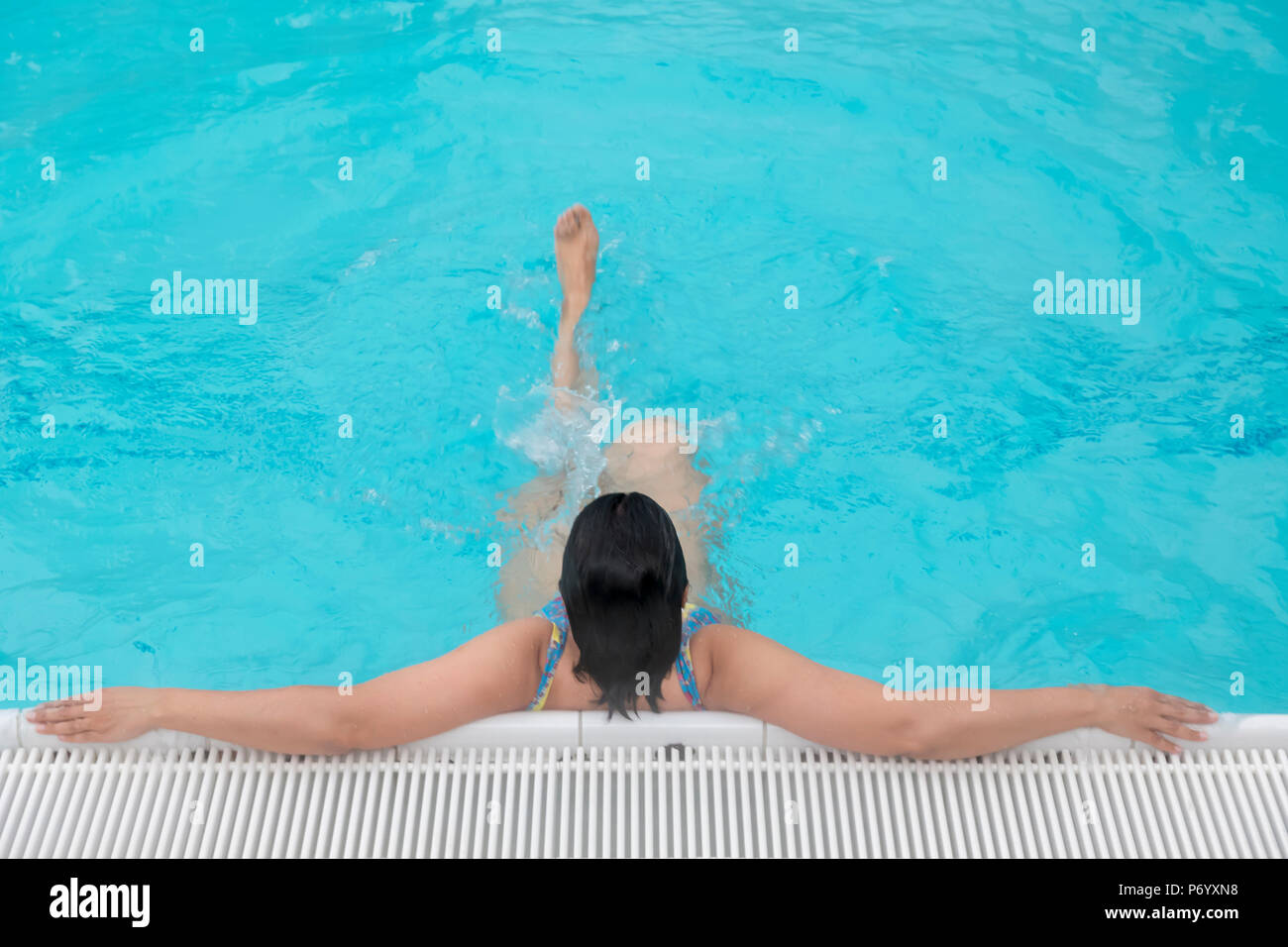 Woman Relax in Swimming Pool Stock Photo - Alamy