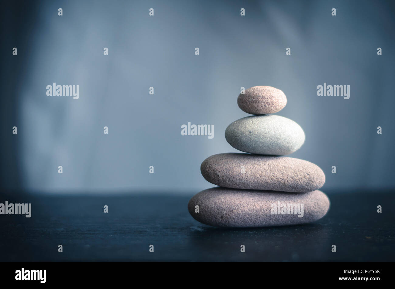 zen stone pyramid is a symbol of stability and balance Stock Photo - Alamy