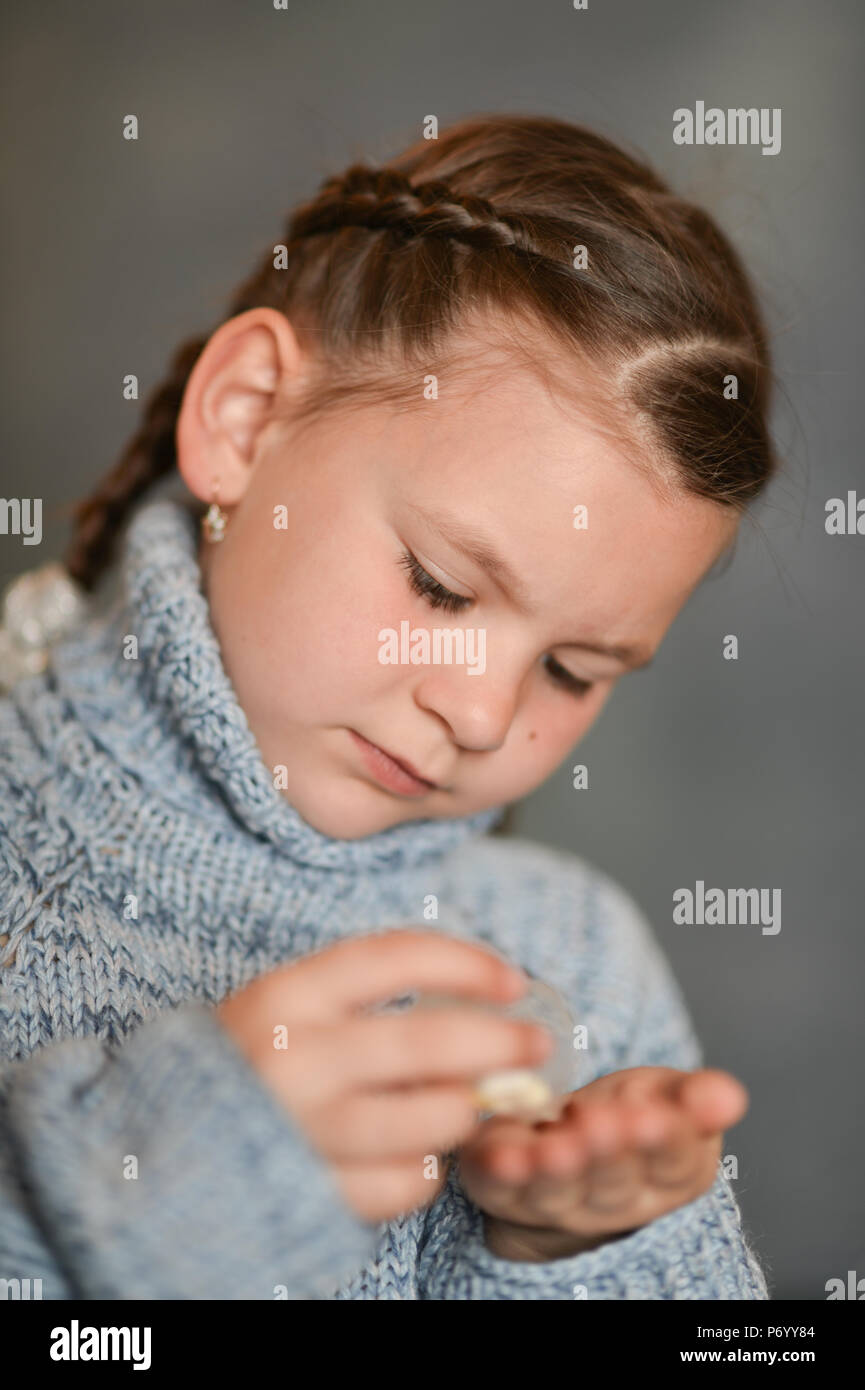 cute sick girl taking medicines Stock Photo - Alamy