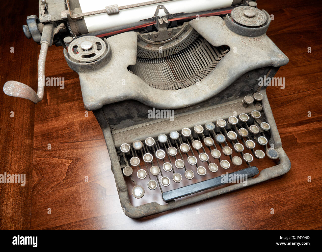 Vintage Typewriter covered with dust on desk Stock Photo - Alamy