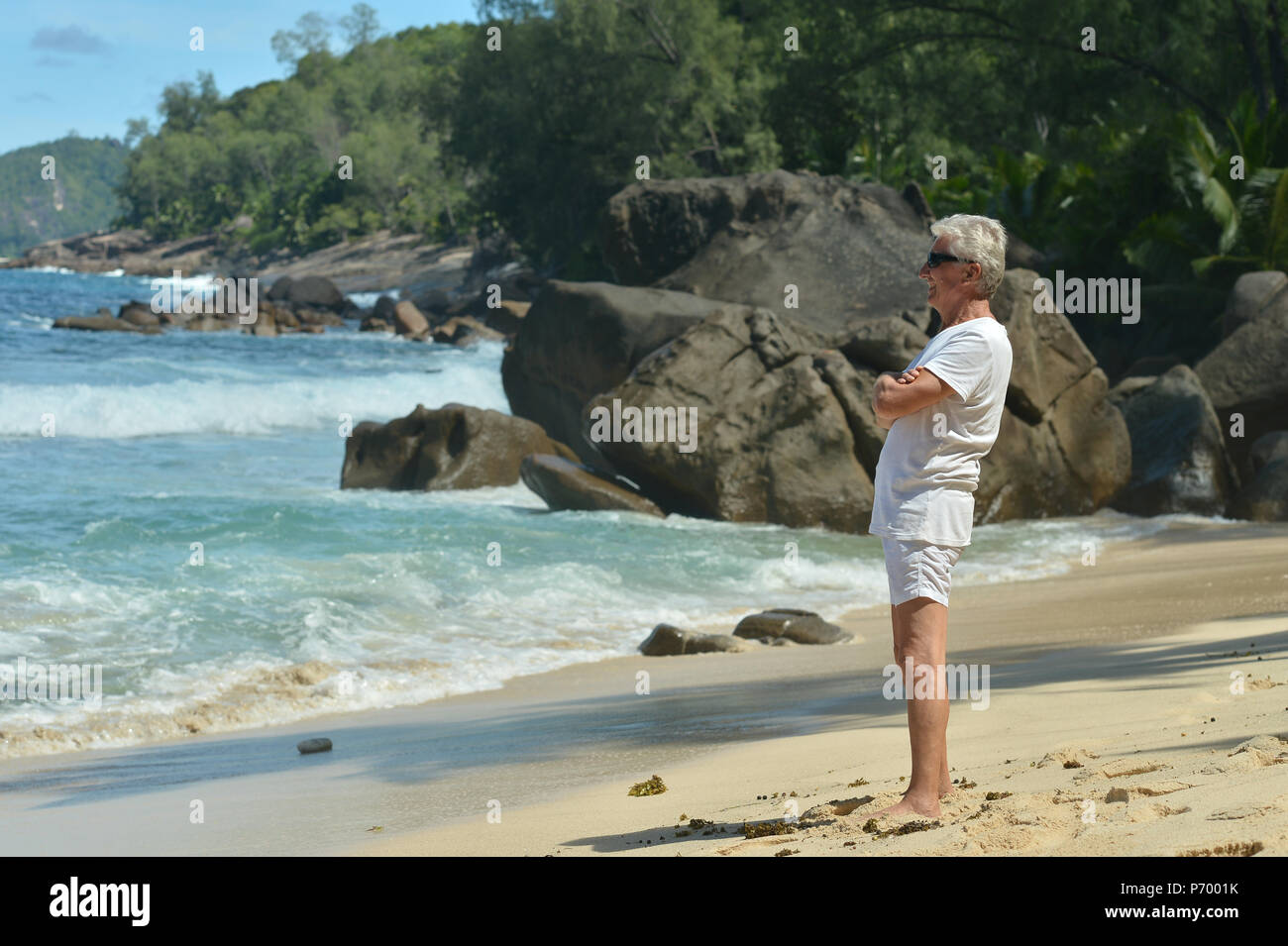 Senior man at tropical resort Stock Photo - Alamy