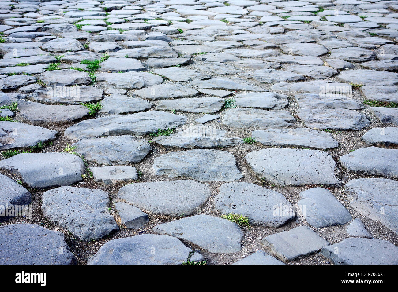 Geometrical pattern made of cobblestones in Rome Stock Photo - Alamy