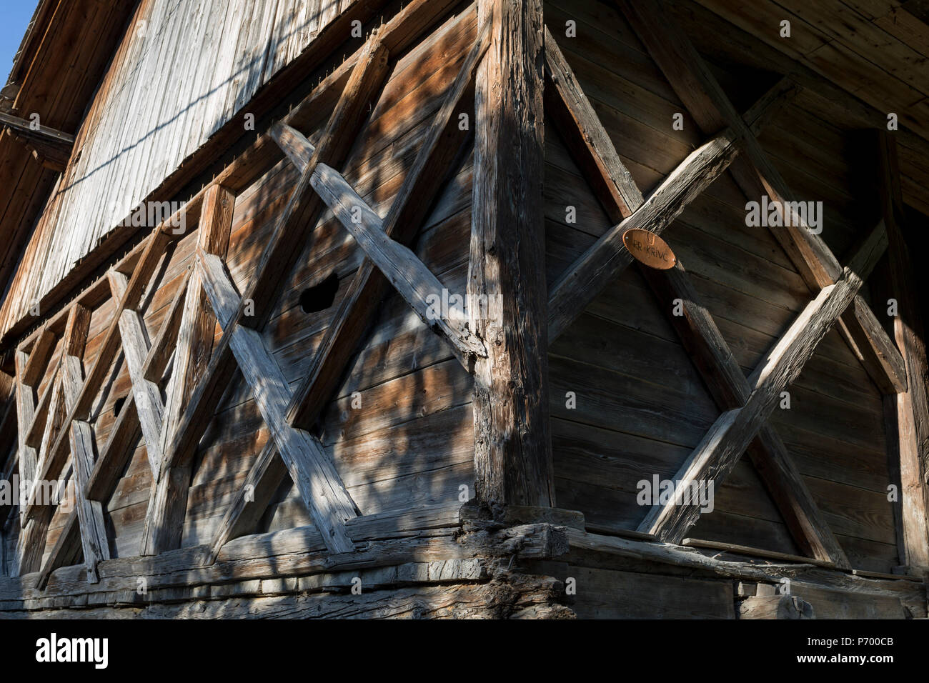 The timbers of a traditional Slovenian barn in a rural village, on 19th ...