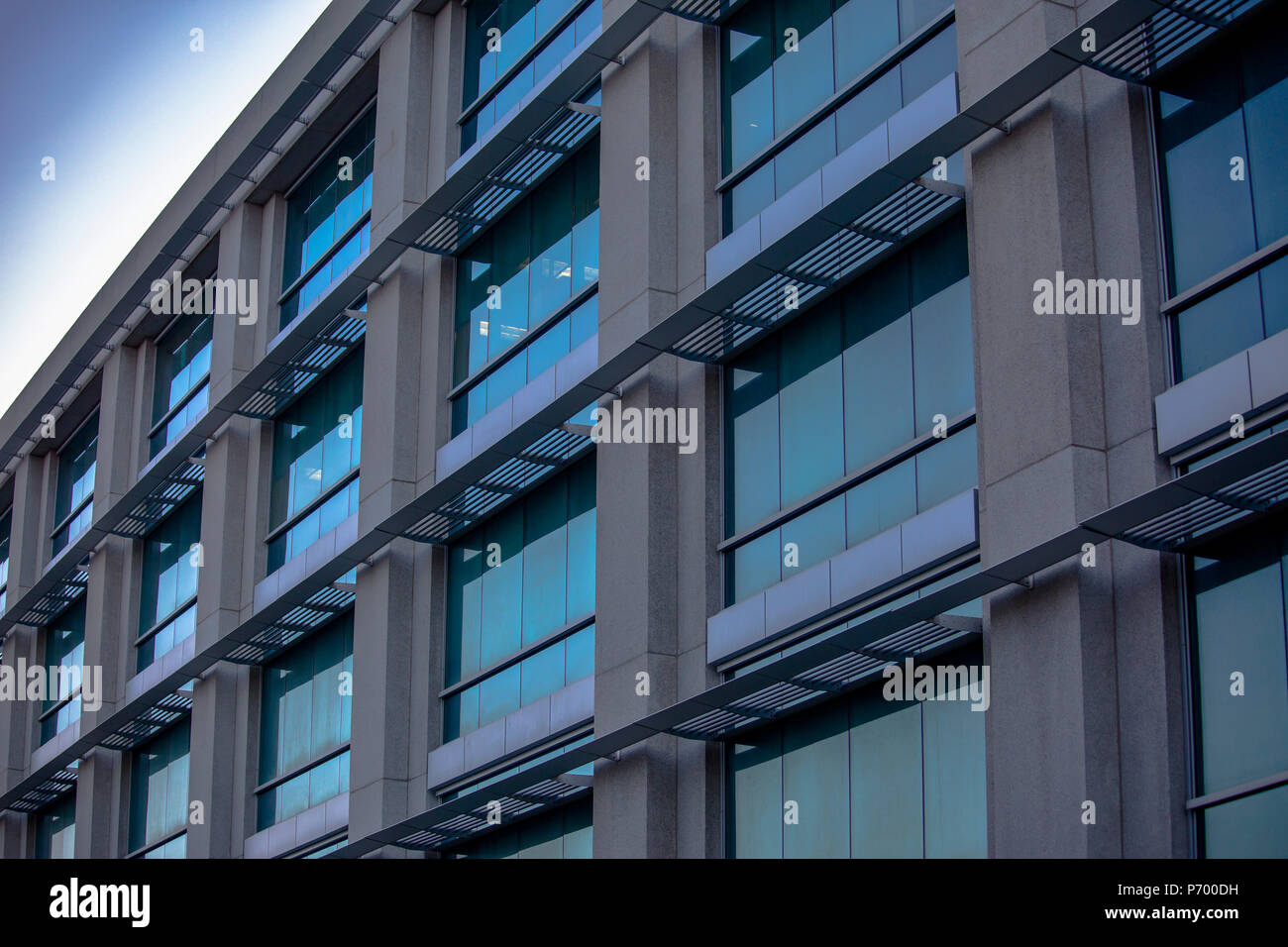 Lower perspective looking up at windows Stock Photo - Alamy