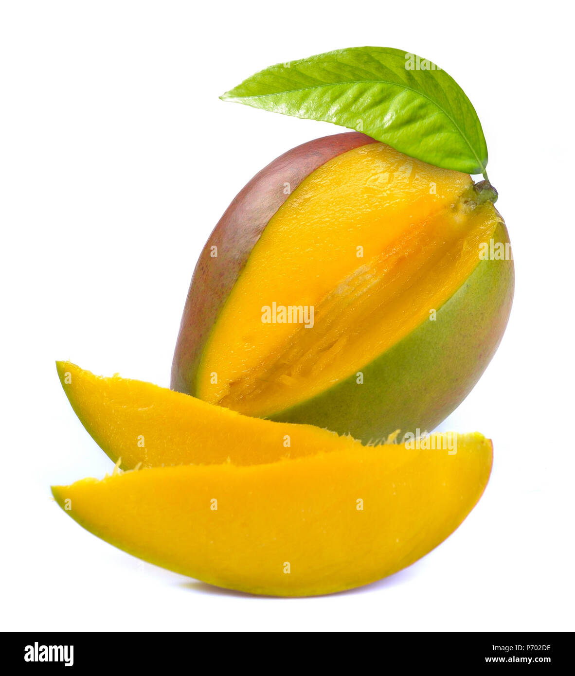 Mango with section on a white background Stock Photo - Alamy