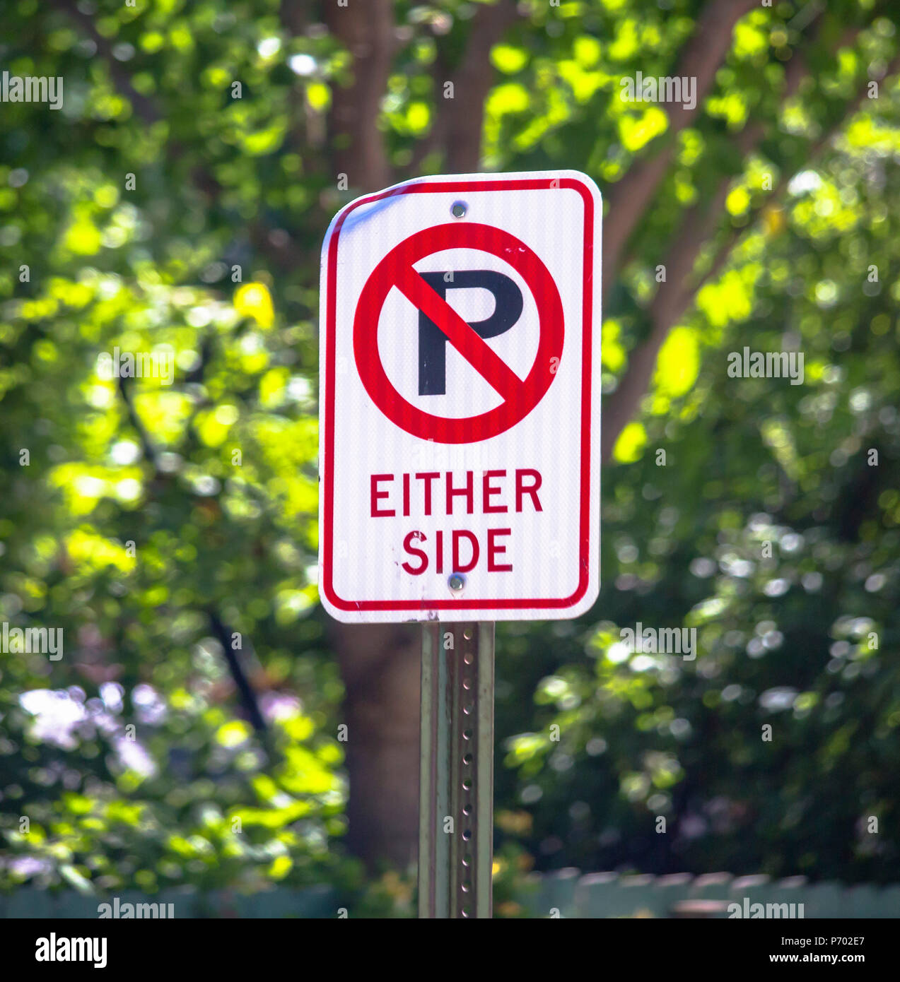 No parking on either side sign Stock Photo - Alamy