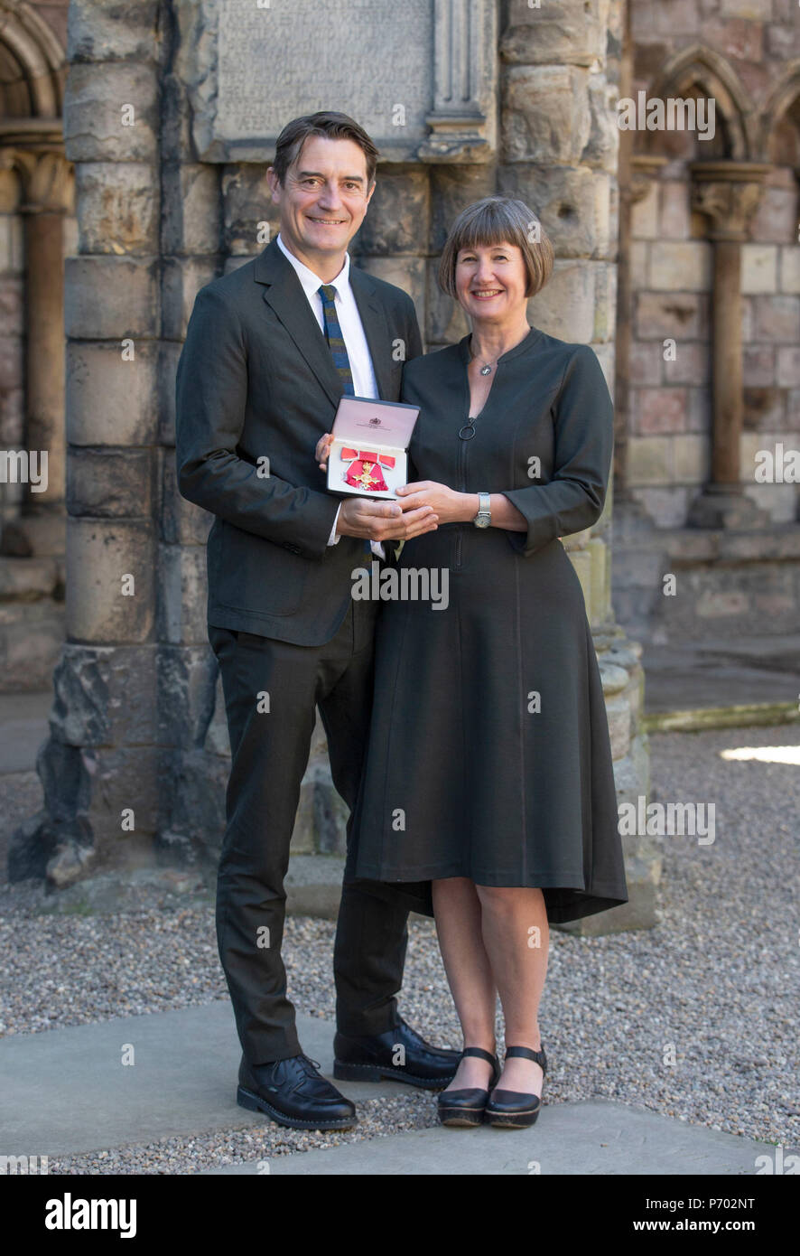 Dr Fiona Bradley, with her husband Nick Barley, after receiving her ...
