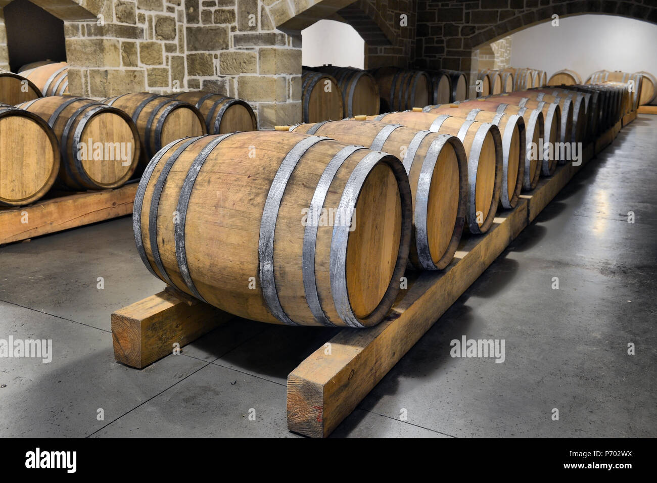 Casks in wine cellar Stock Photo - Alamy
