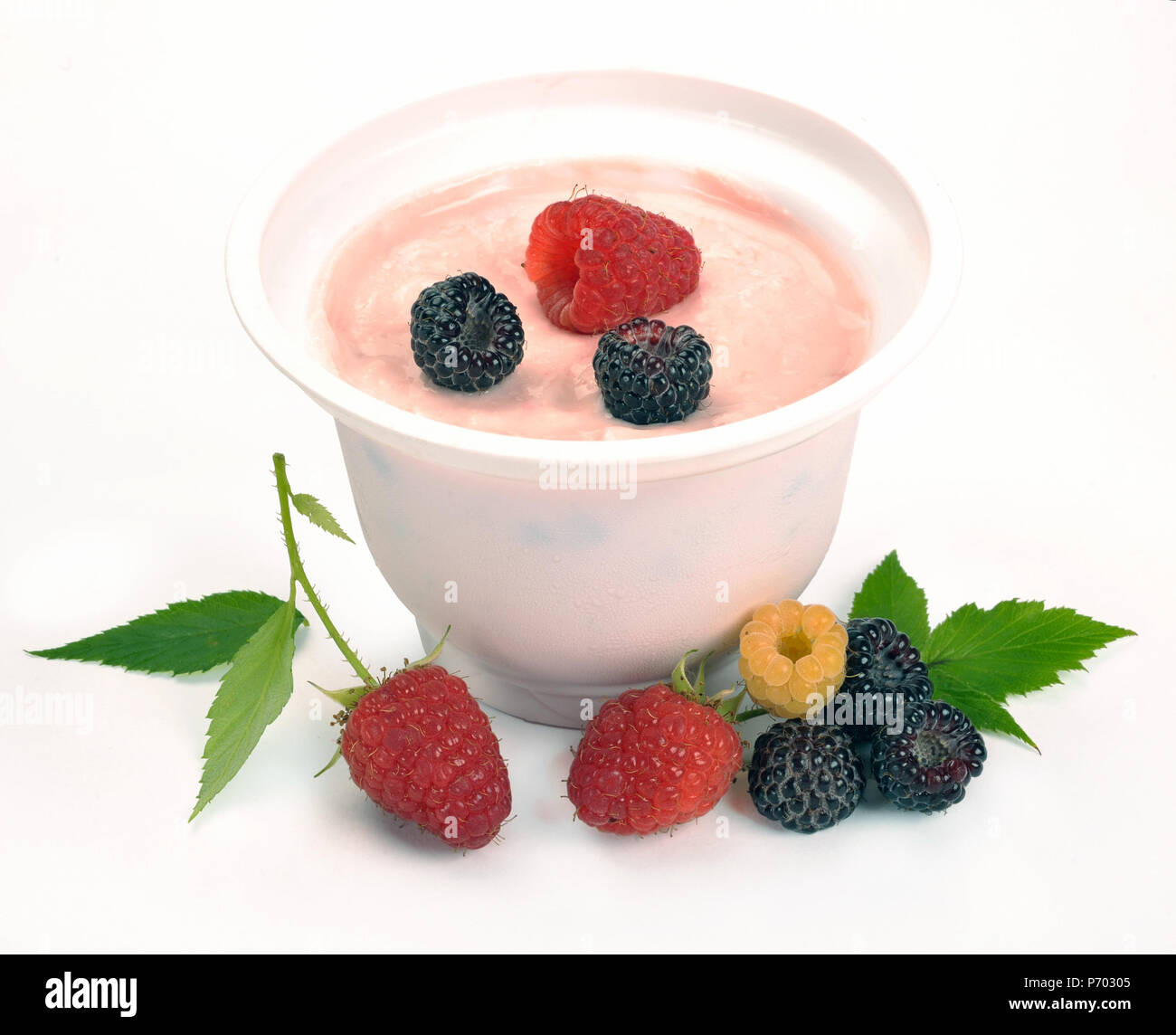 yoghurt with raspberry on a white background Stock Photo - Alamy