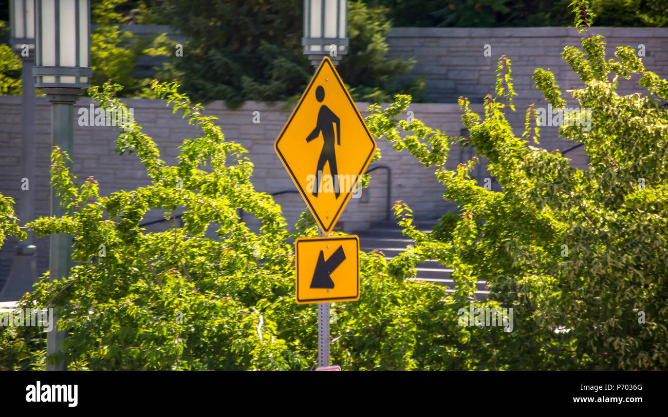 Pedestrian crossing sign for crosswalk Stock Photo - Alamy