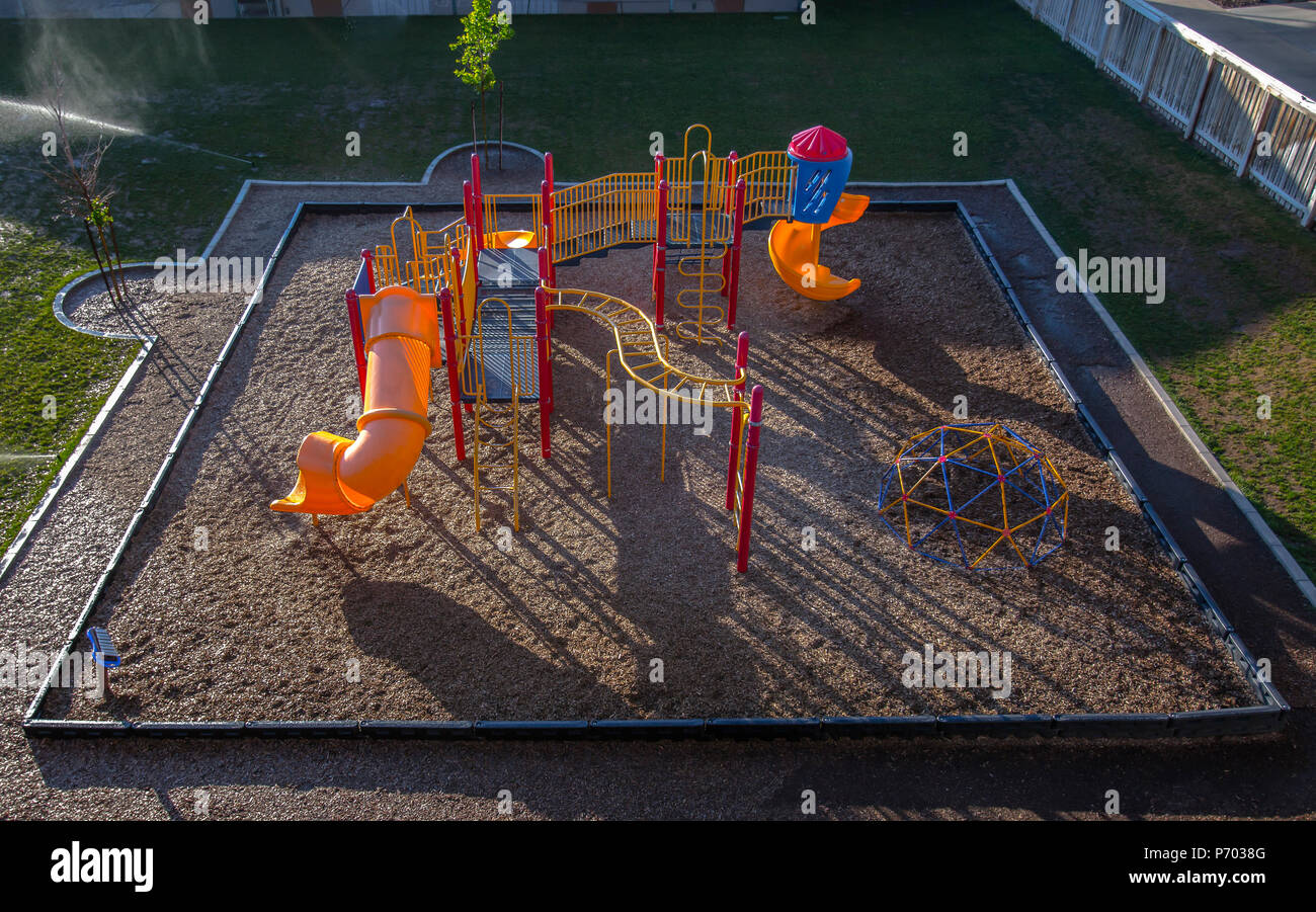 Playground at school in the late afternoon Stock Photo - Alamy