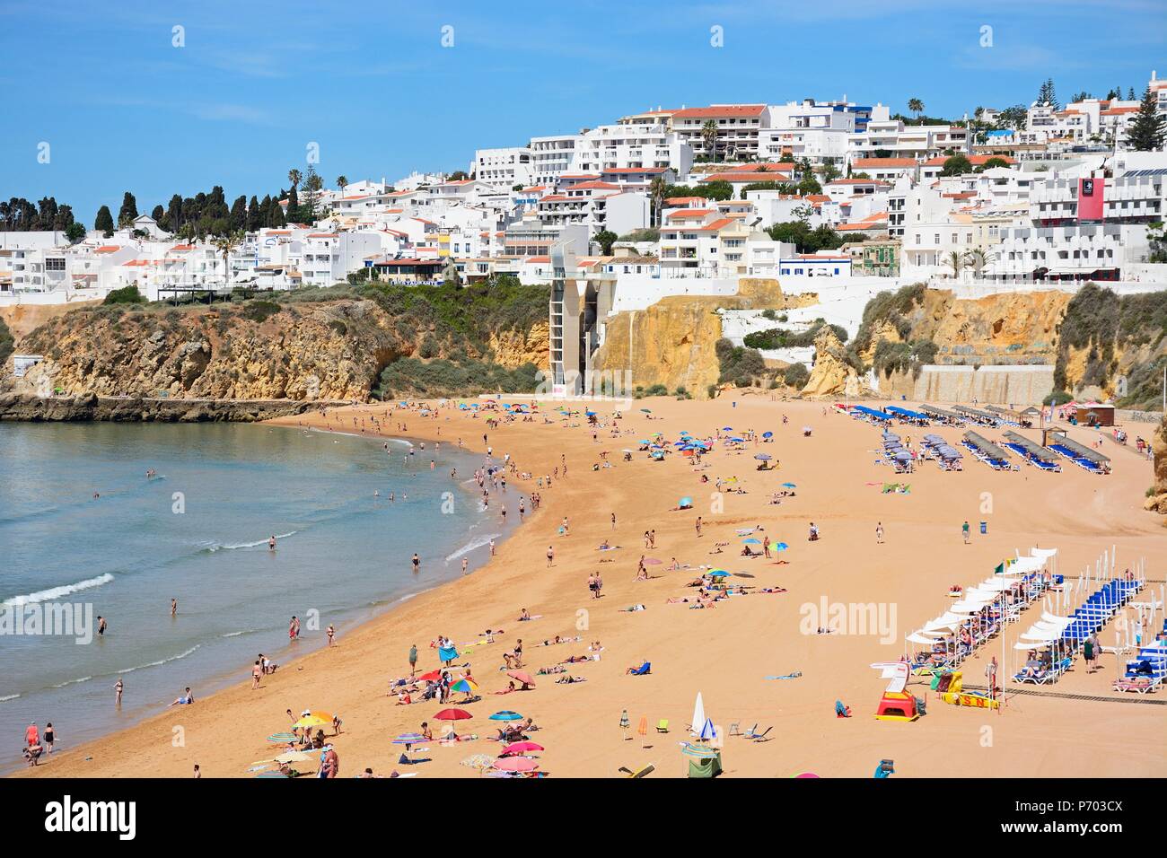 Elevated view of the beach and town with people enjoying the setting ...