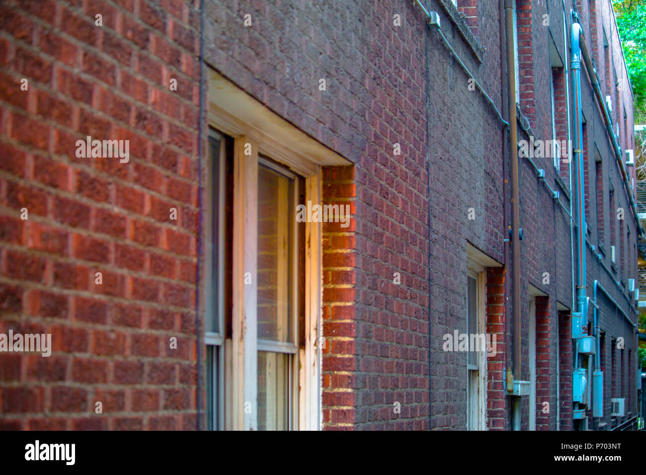Red brick and windows in downtown Stock Photo - Alamy