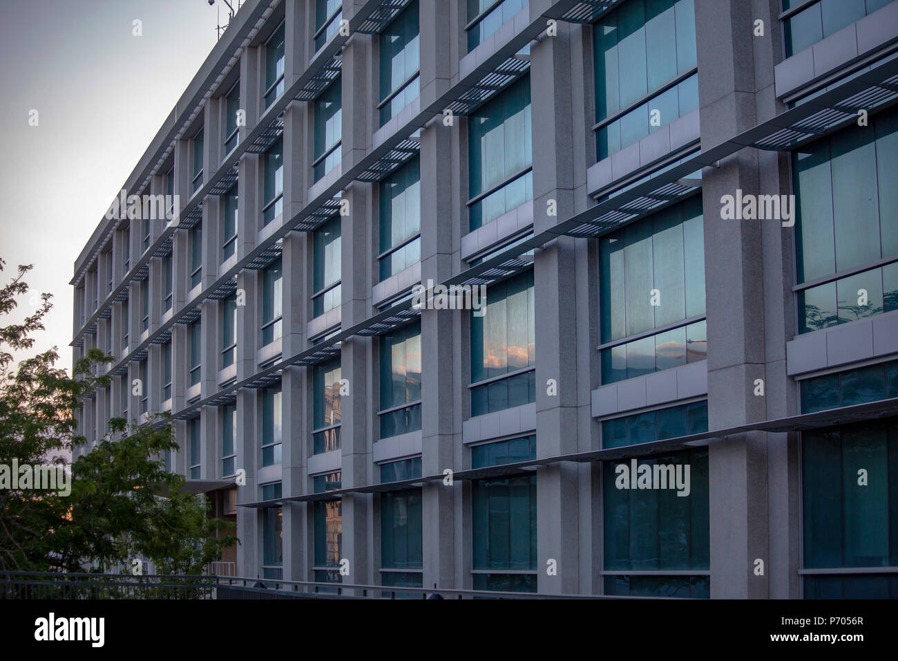 Side of building with windows at twilight Stock Photo - Alamy