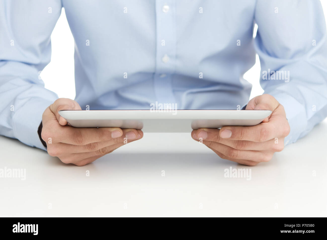 Using digital tablet Stock Photo - Alamy