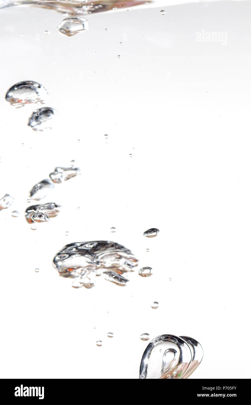 drop and bubble into the water still life Stock Photo - Alamy