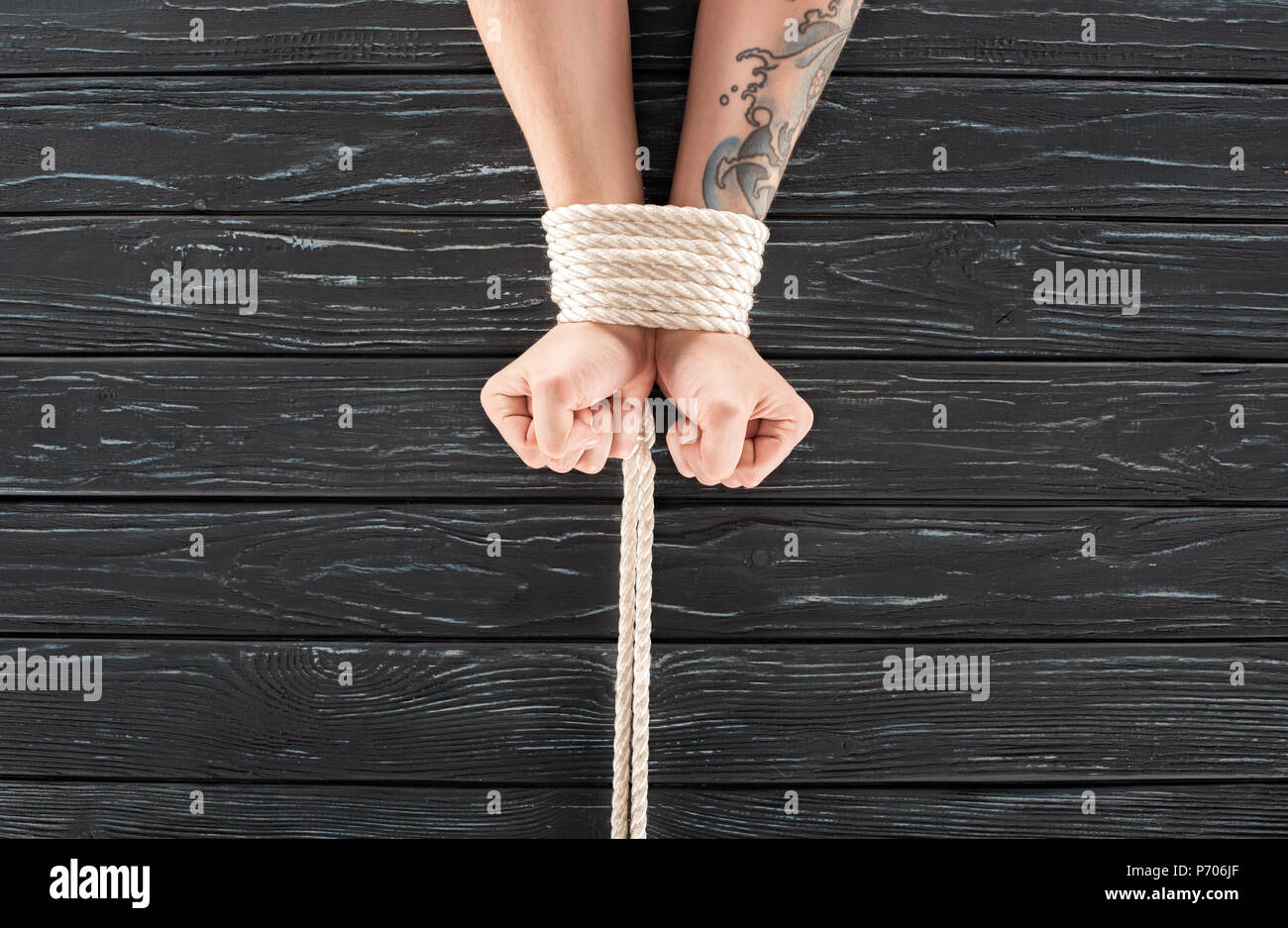 Tied Hands Rope Stock Photos & Tied Hands Rope Stock Images - Alamy