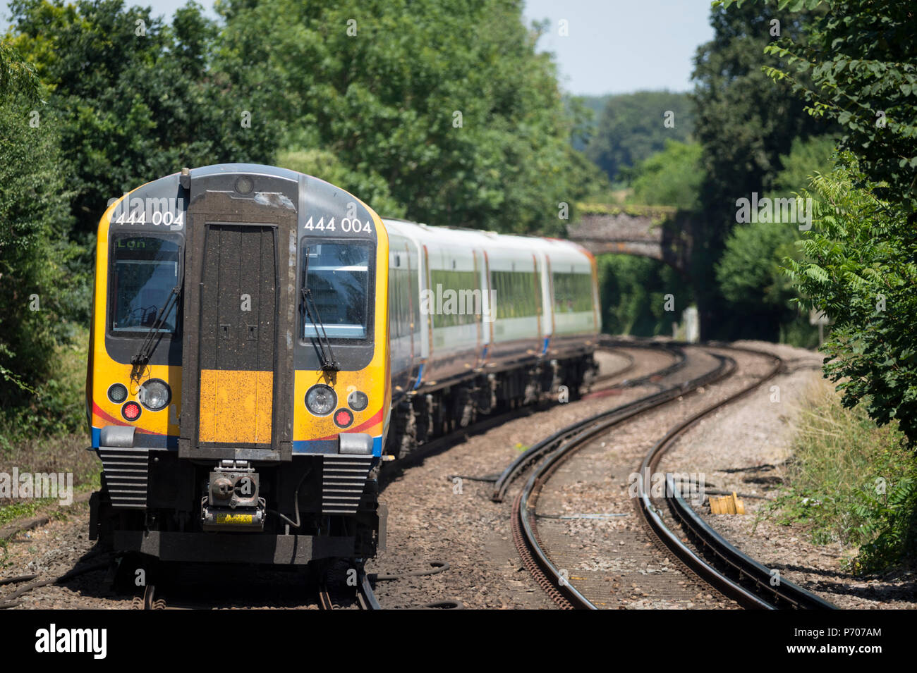 South Western railway 444 Class commuter train northbound between ...