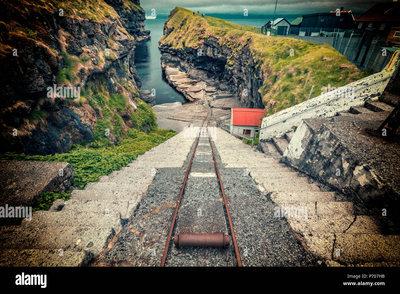 famous natural harbours in Gjogv faroe island Stock Photo - Alamy