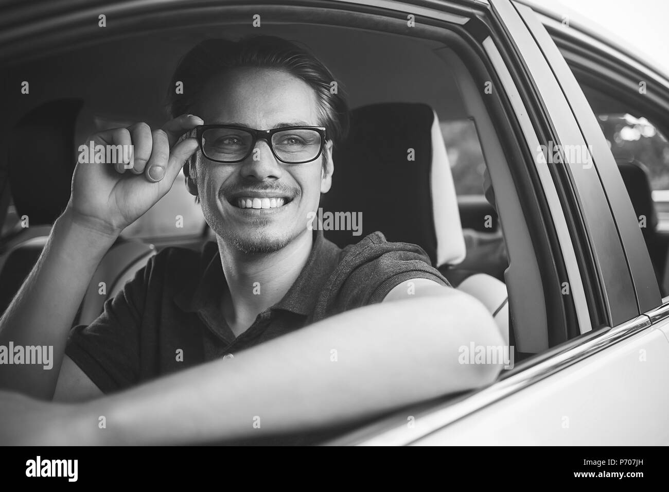 Cool guy in car Black and White Stock Photos & Images - Alamy