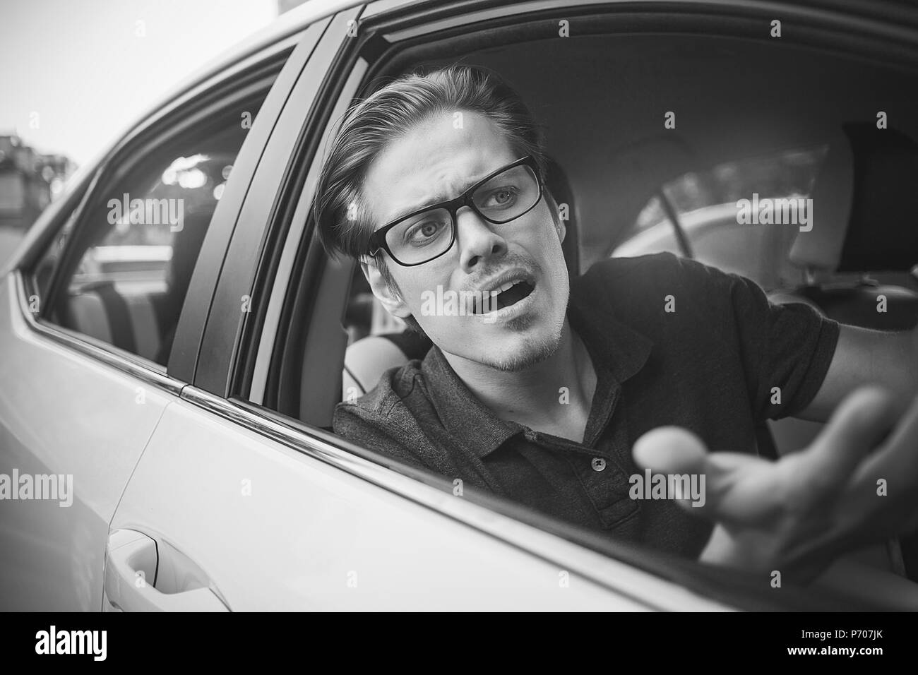 Accident. Young caucasian man driving a car shocked about to have ...