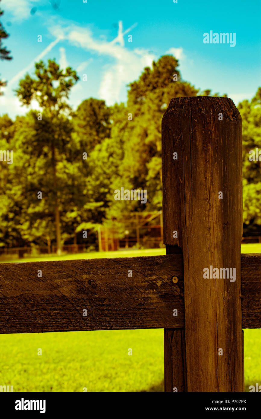 Fence around large baseball field Stock Photo - Alamy
