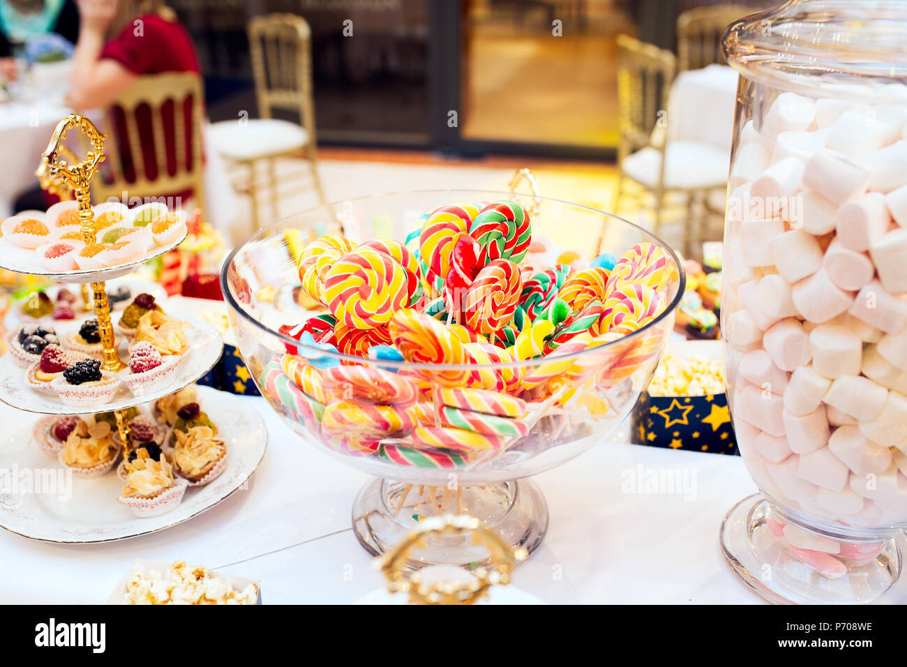 Colorful lollipops on a festive table Stock Photo - Alamy