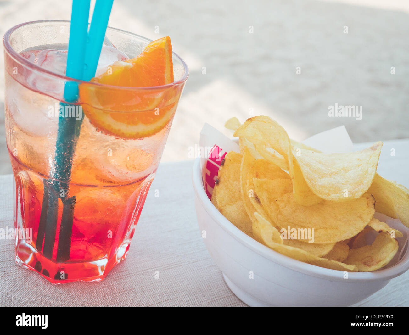 Summer appetizer with spritz cocktail and chips on the beach Stock ...