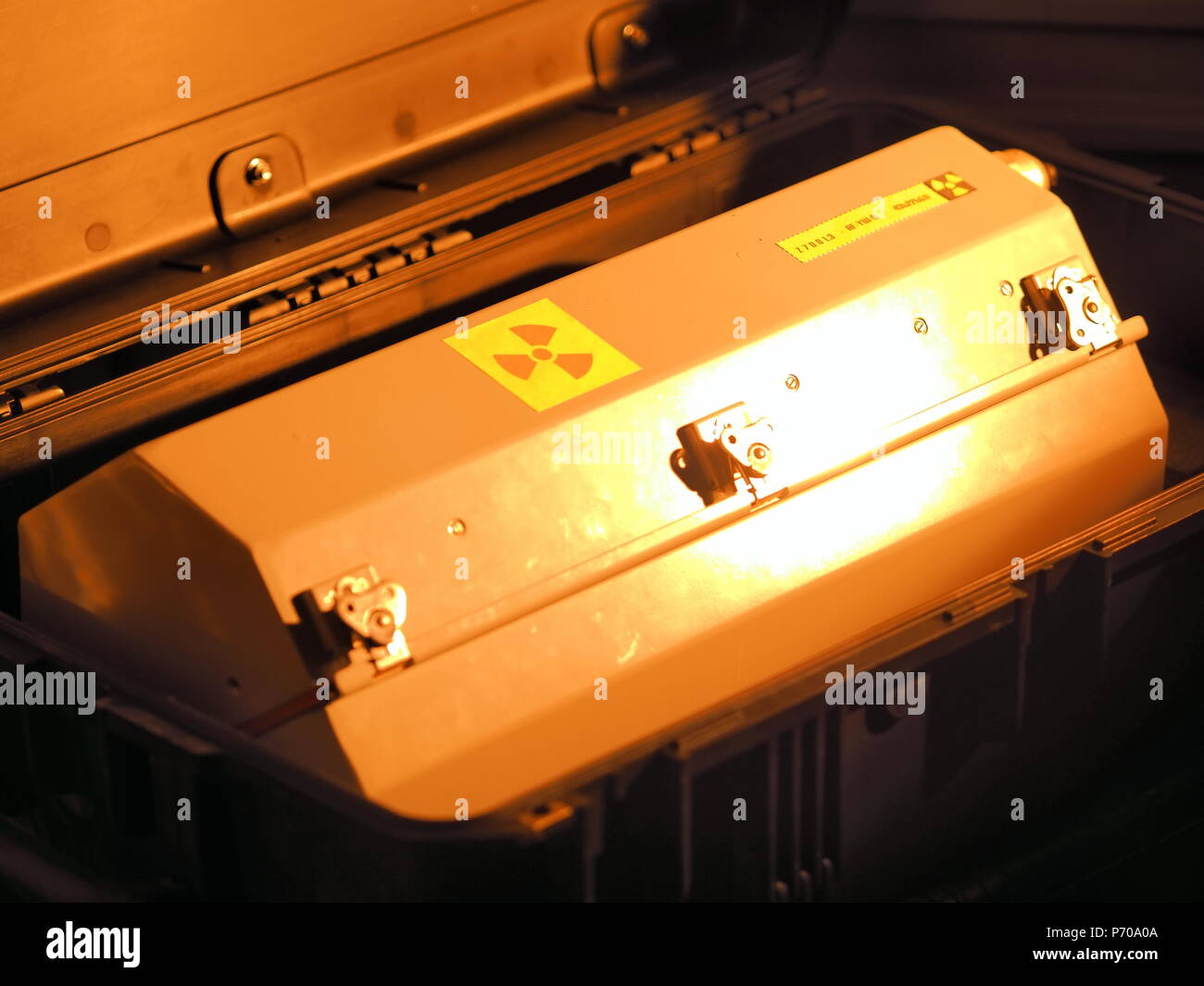 Box shaped metal container with radiation warning in a military grade ...