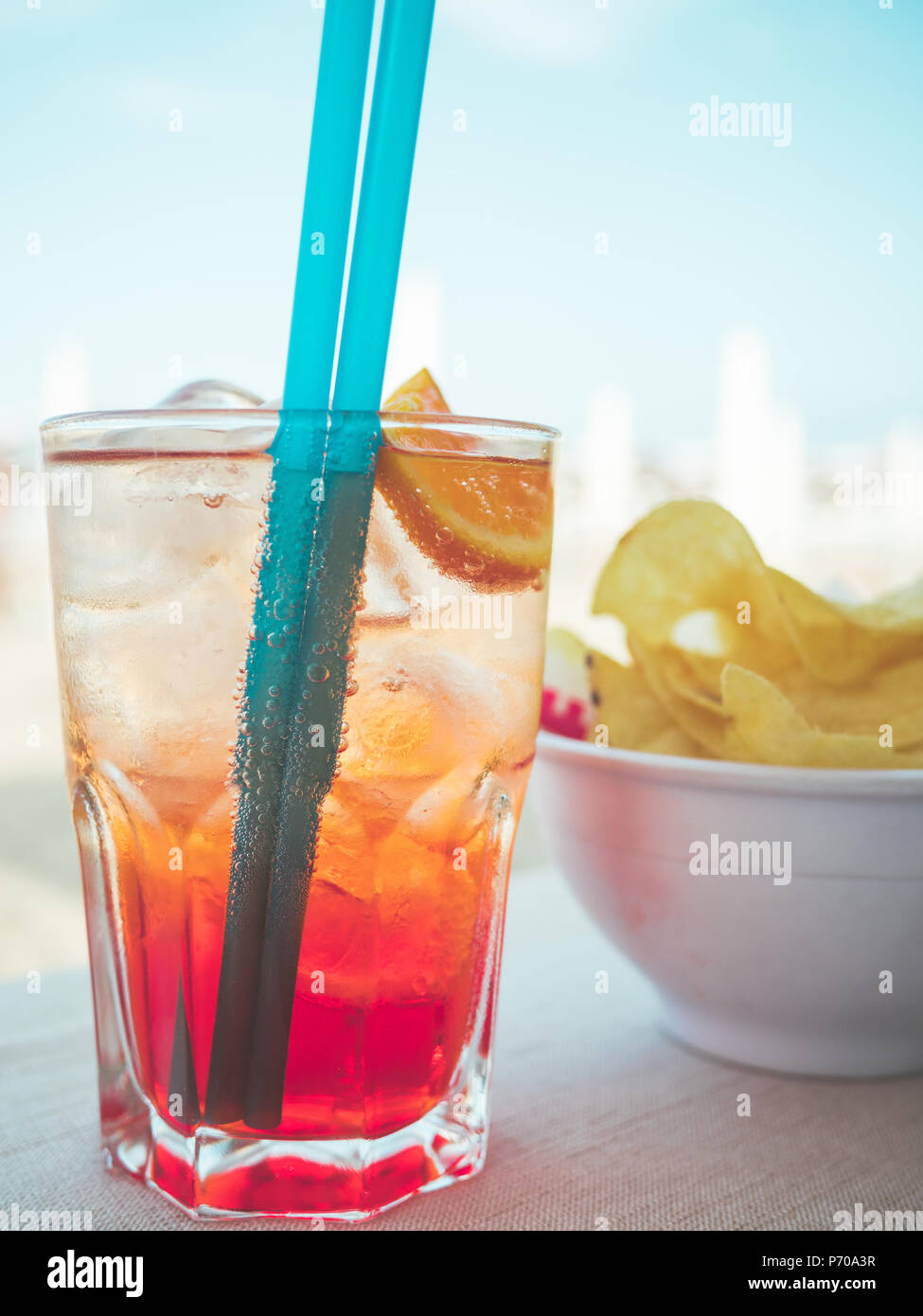 Summer appetizer with spritz cocktail and chips on the beach Stock ...