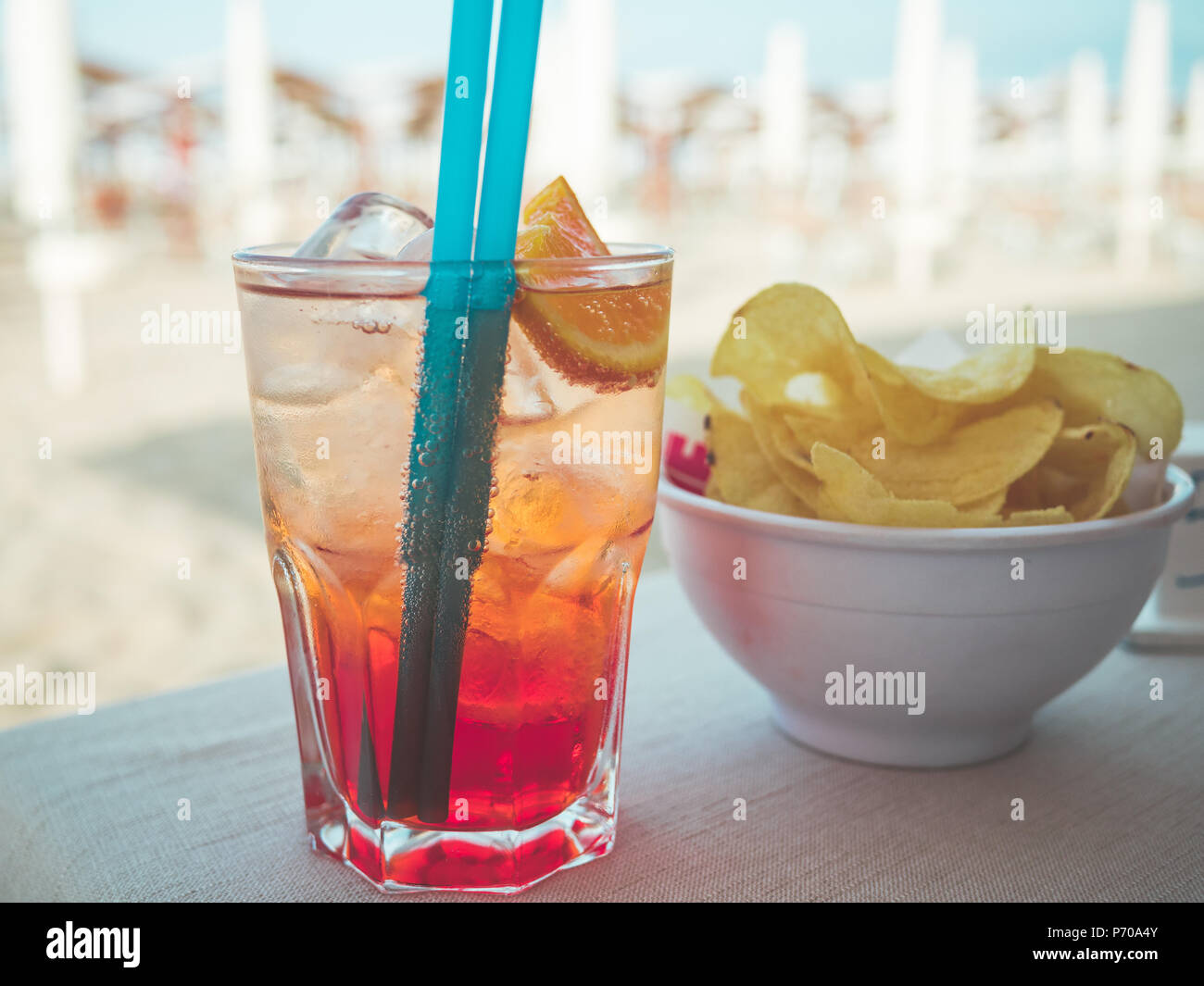Summer appetizer with spritz cocktail and chips on the beach Stock ...