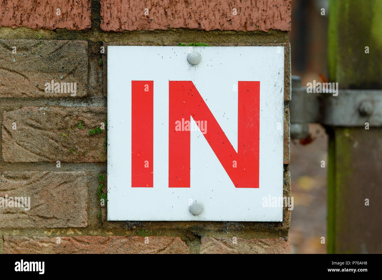 In sign on wall Stock Photo - Alamy