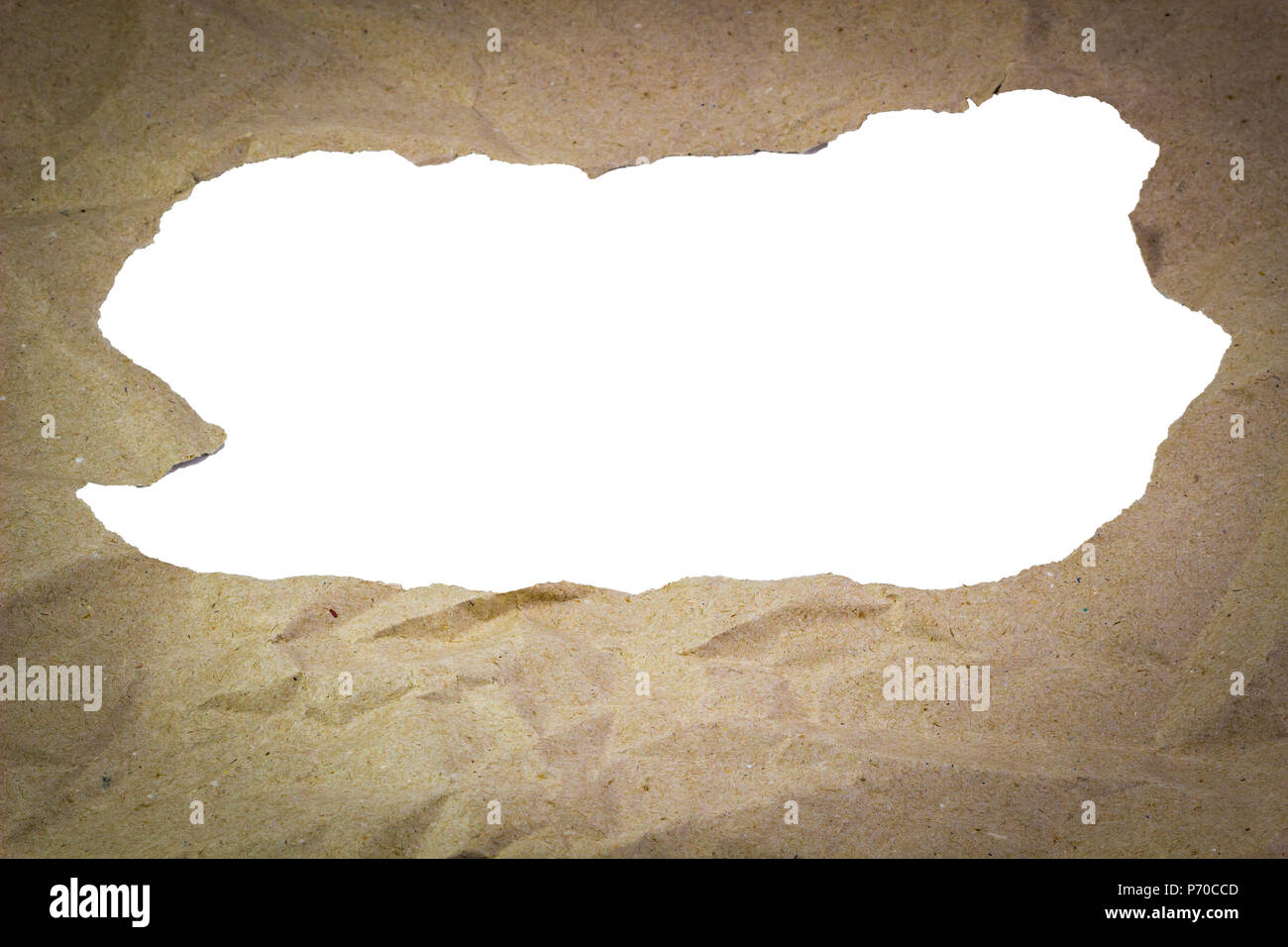 Old ripped brown paper with white color background / ripped in brown ...