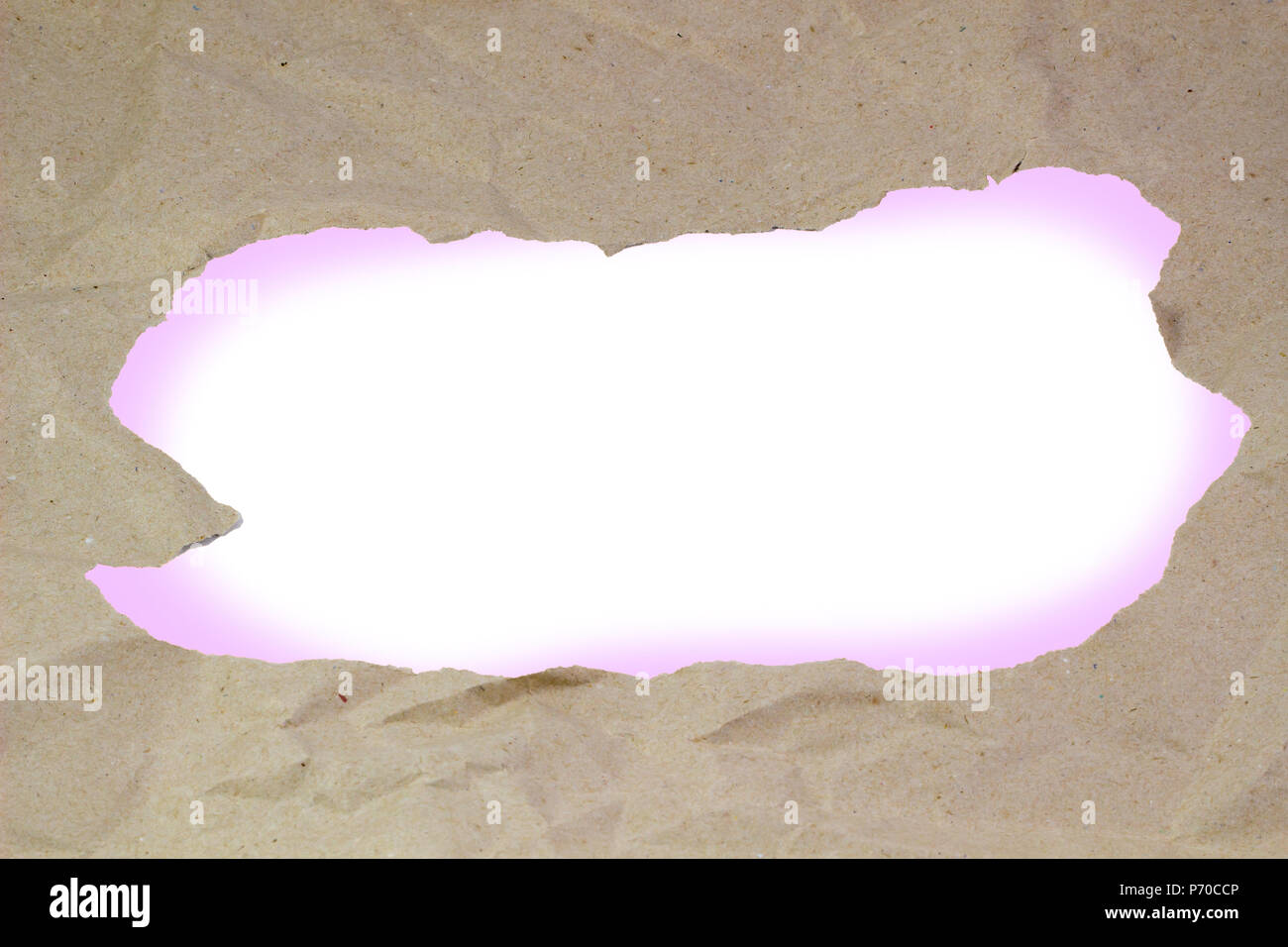 Old ripped brown paper with white color background / ripped in brown ...