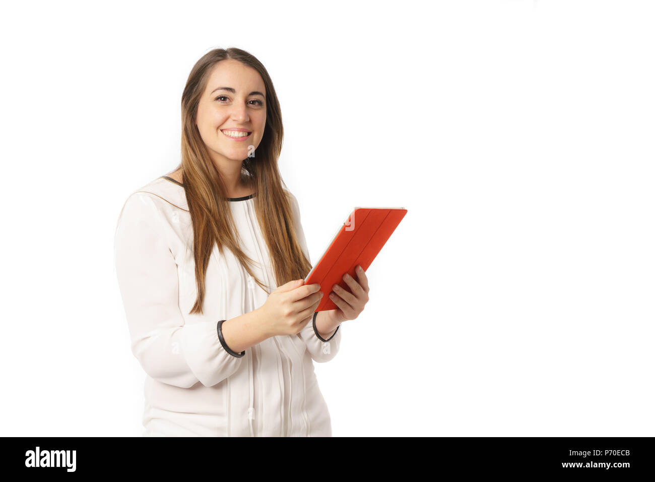 Happy office woman reading tablet pc on white Stock Photo - Alamy