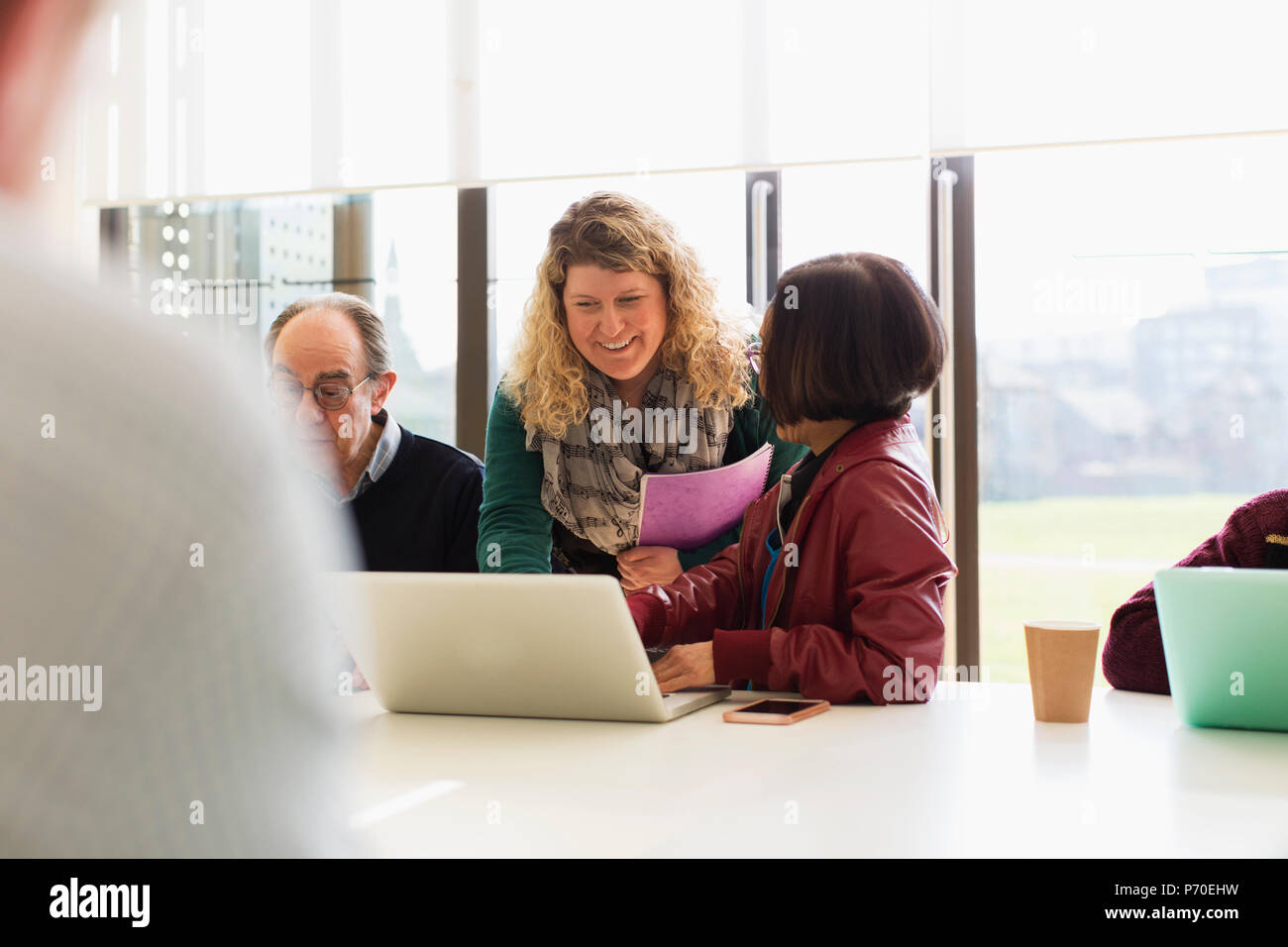 Business people talking in conference room meeting Stock Photo - Alamy