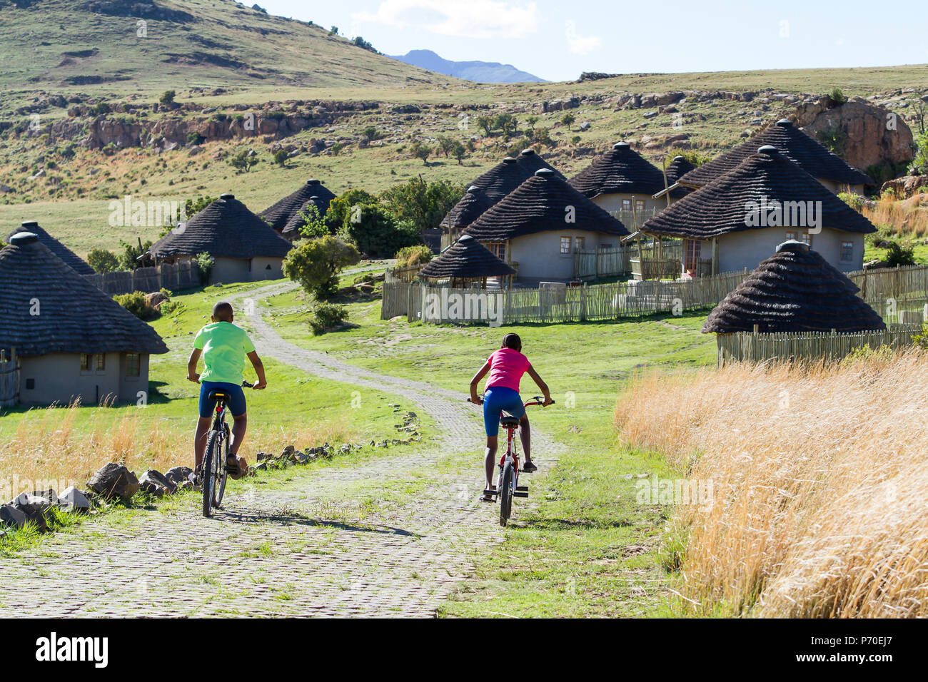 African Children riding bikes in a rural village in South Africa Stock ...