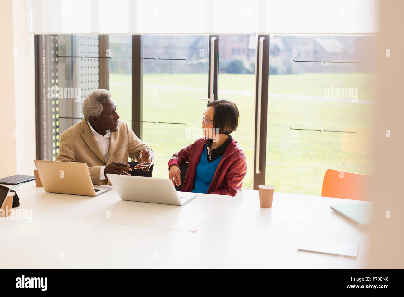 Seniors in business hi-res stock photography and images - Alamy